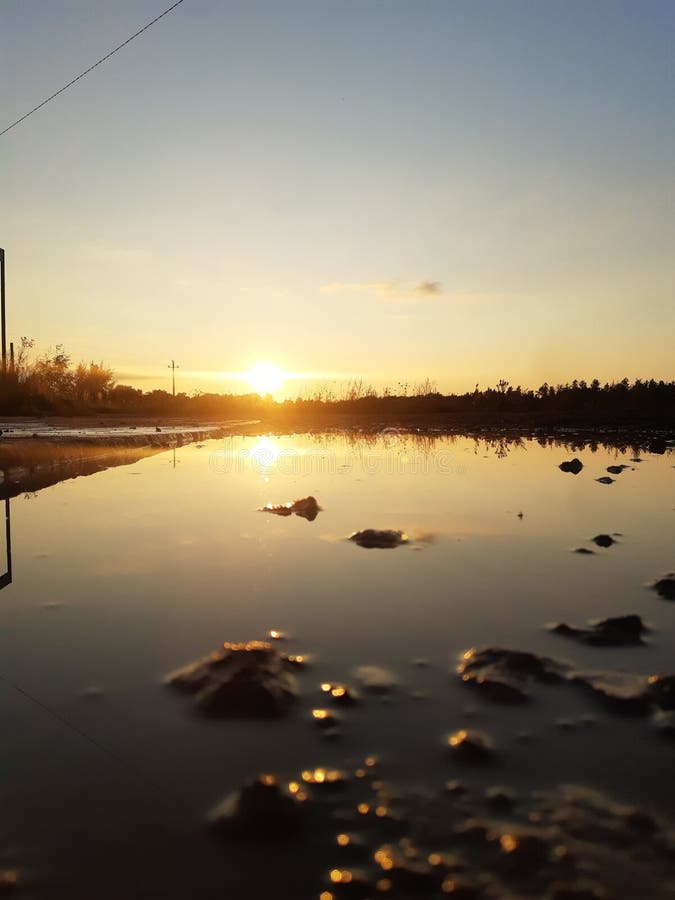 Sun Rays Reflecting in the Rapids of a Small River in Winter Stock ...