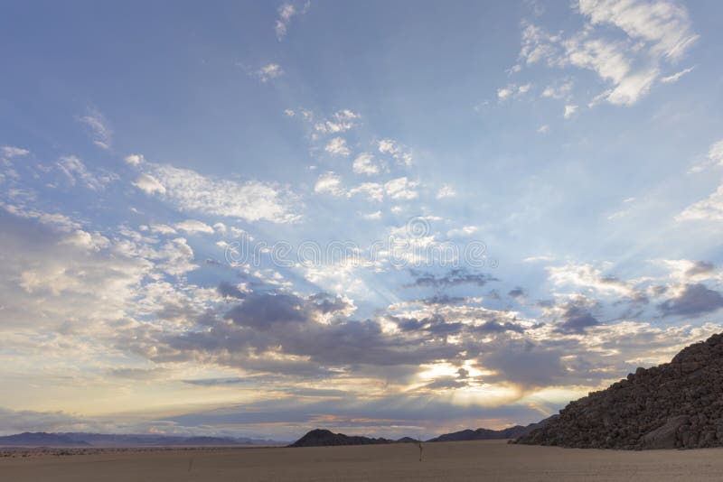 Sun Rays Shine through the Clouds Stock Photo - Image of summer, brown ...