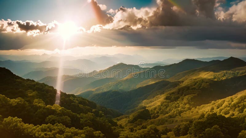 Sun Rays Shine through Clouds Over Dramatic Mountain Landscape during ...