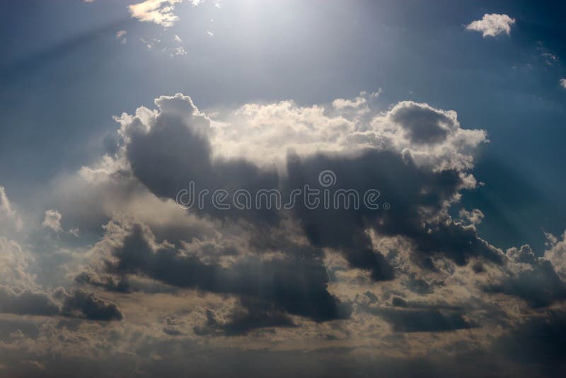 Sun Rays Shine through the Clouds Over the Sea Stock Image - Image of ...