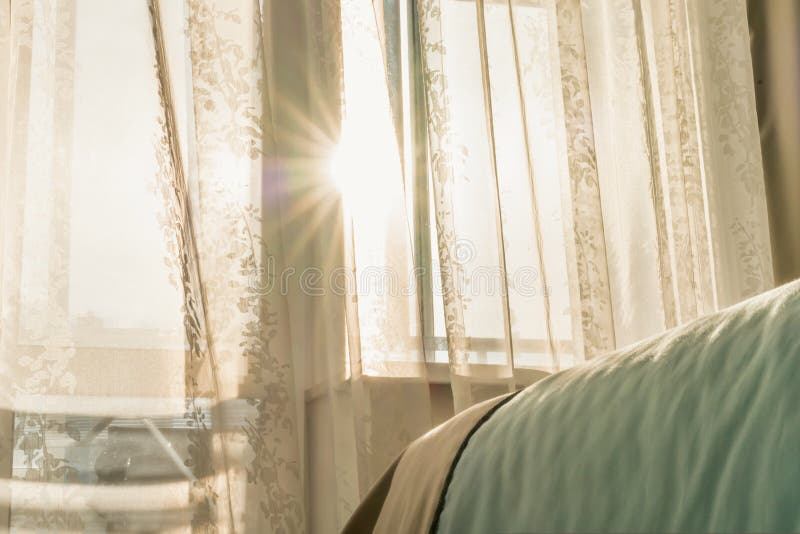 Sun Rays Shining through the Curtain Stock Photo - Image of cloth ...