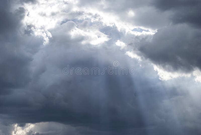Sun Rays Shining through Storm Clouds Stock Photo - Image of color ...