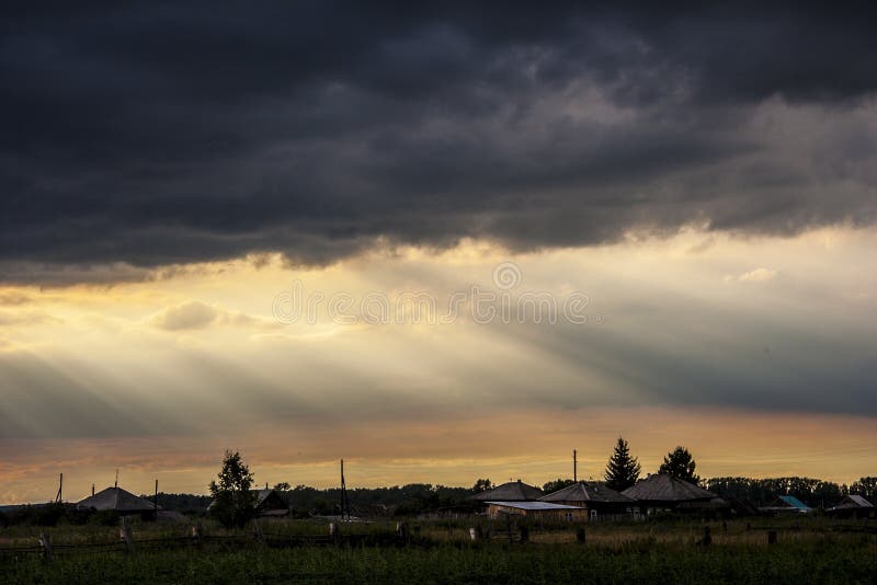 Sun Rays through Storm Clouds and Clouds Stock Photo - Image of storm ...