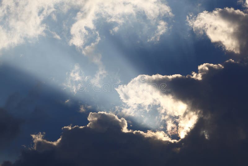 Sun Rays through Storm Clouds Stock Photo - Image of landscape, blue ...