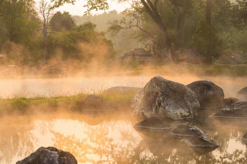 Sun Reflecing on the Hot Spring at National Park during Sunrise Stock ...