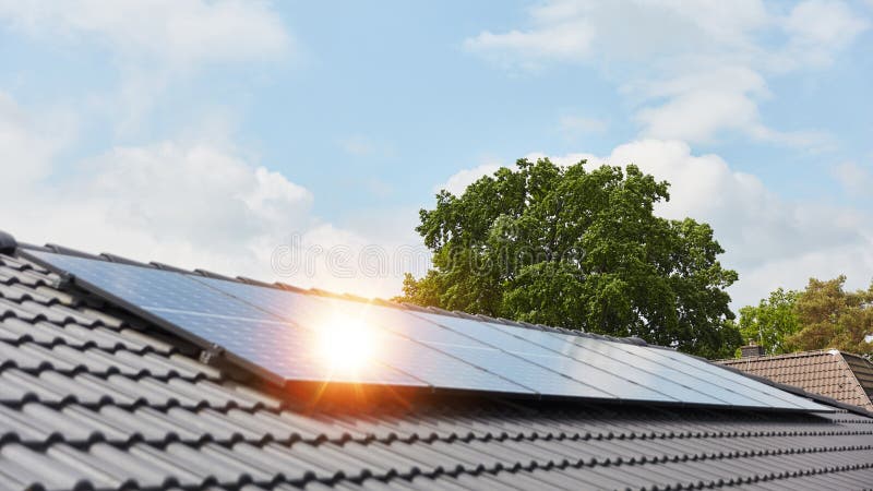 The Sun is Reflected in a Modern Solar System on the Roof of the House ...