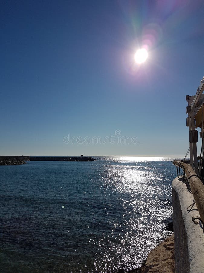 The Sun Reflected in the Sea Stock Photo - Image of reflection, terrace ...