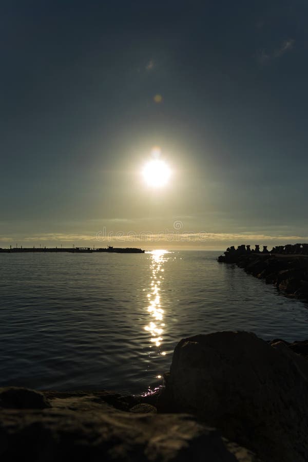 Sun reflected in the sea stock photo. Image of shore - 120608418