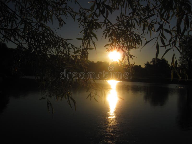 Sinking Sun stock photo. Image of sunset, cloudy, countryside - 152980208