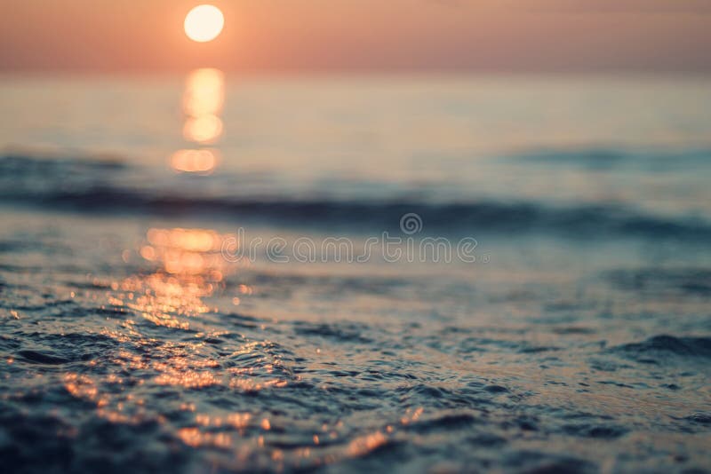 A Sun Reflecting on a Sea Surface at Sunset Stock Photo - Image of ...