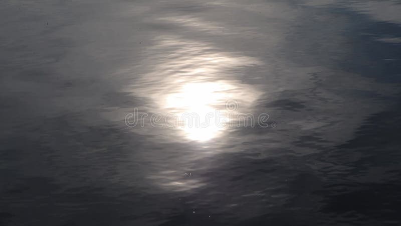 Sun Reflecting on Slightly Moving Water Surface Stock Footage - Video ...