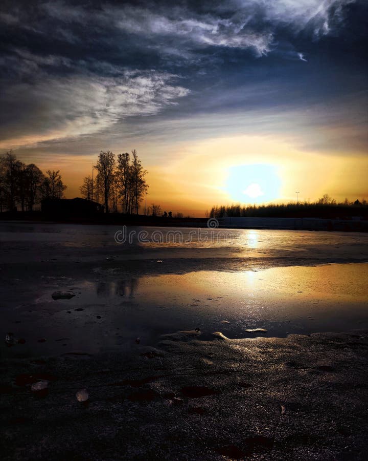 Sun reflection on ice stock image. Image of dusk, wave - 212878787