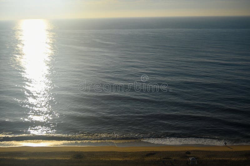 Sun Reflection on Ocean Water Stock Image - Image of sunlight, sand ...