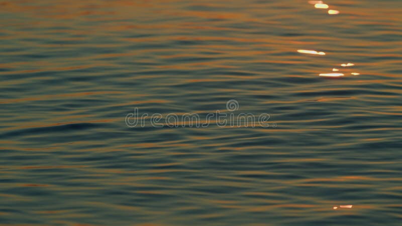 Sun Reflection and Ripples on Sea Water Surface at Sunset. Sea Water ...