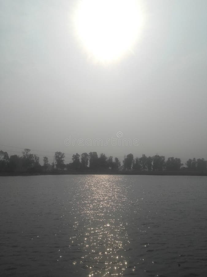 Sun Reflection in the Water Stock Photo - Image of water, reflection ...