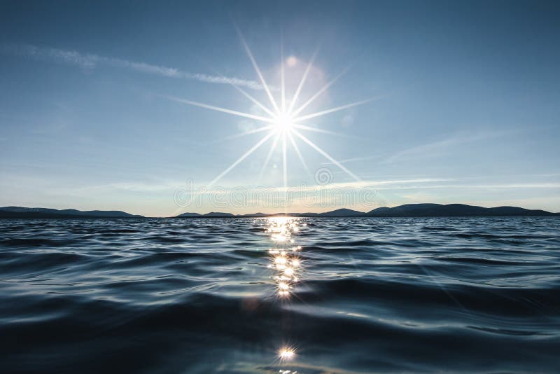 Sun Reflections stock photo. Image of blue, bright, beams - 86903496