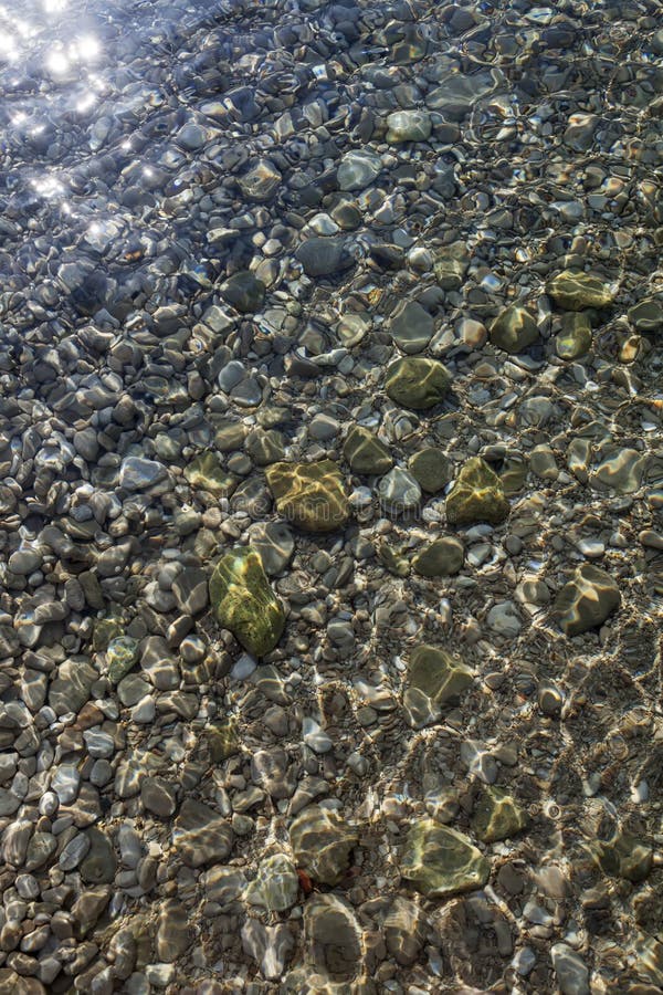 Sun Reflections in Crystal Clear Sea Watter Stock Image - Image of ...