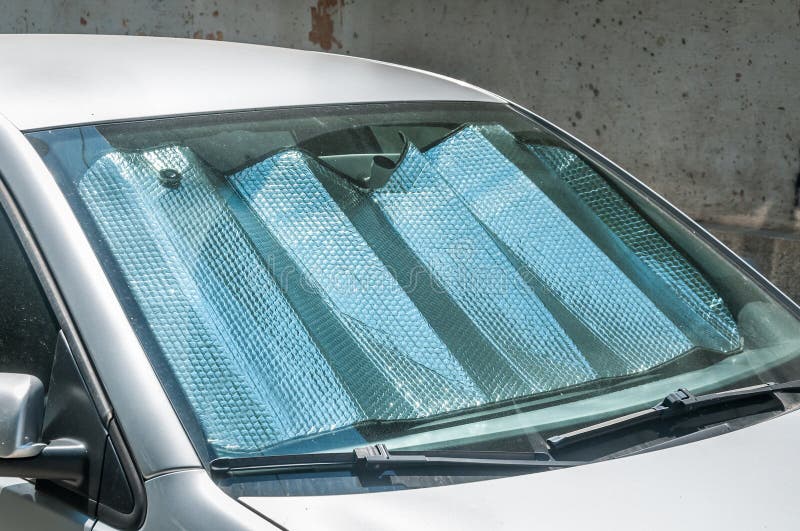 Sun Reflector on the Windscreen or Windshield As Protection of the Car ...