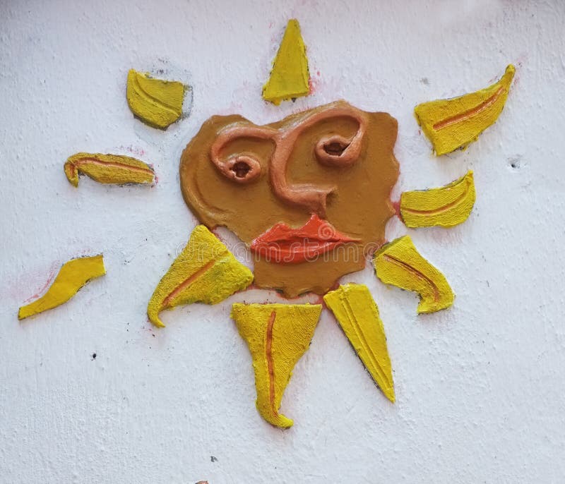 Sun relief on white wall stock image. Image of craft - 44714279