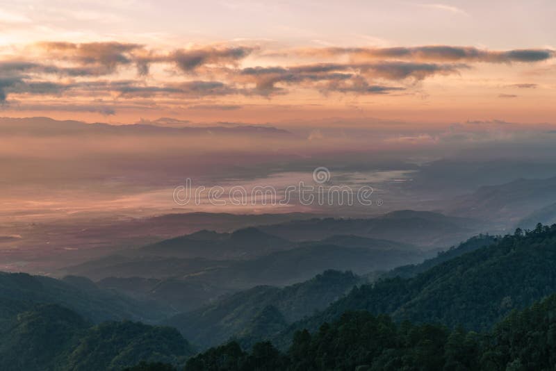 Valley in the mist stock photo. Image of season, alps - 1303412