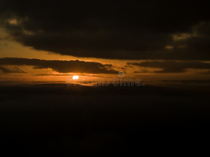Sun Rise through Clouds stock photo. Image of horizon - 265490338