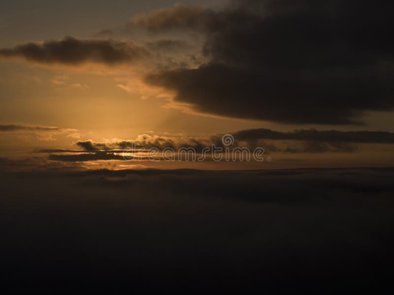 Sun Rise through Clouds stock photo. Image of dark, blue - 265490352