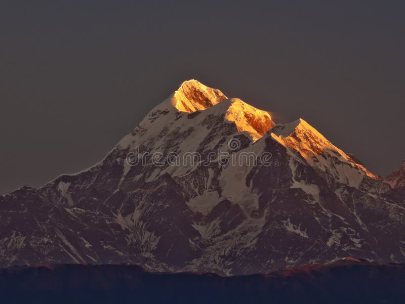 Sun rise on Mount Trishul stock image. Image of altitude - 32849319