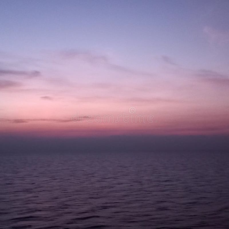 Sun rise in the ocean stock image. Image of ocean, sunset - 254867795