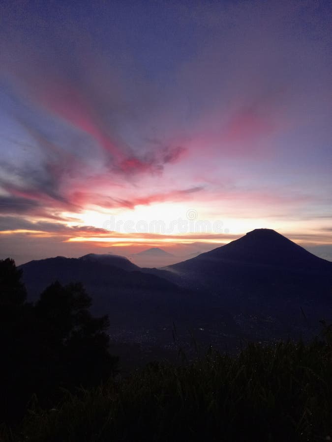 Sun Rise on Sikunir Dieng stock photo. Image of rise - 261764524
