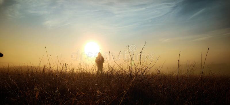 Sun Rise of Young Men in Hoody Stock Image - Image of tree, sunrise ...
