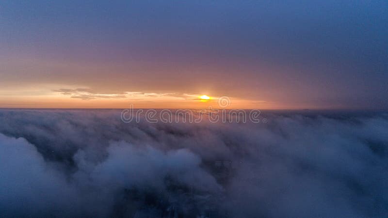 The Sun Rises from Above the Clouds Stock Photo - Image of rises ...