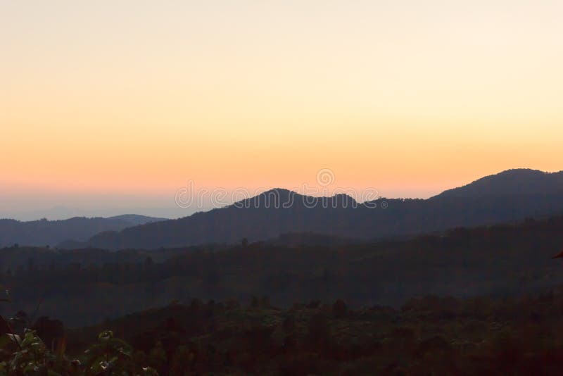 Sun Rises Behind Mountain Over A River Valley Stock Image - Image of ...