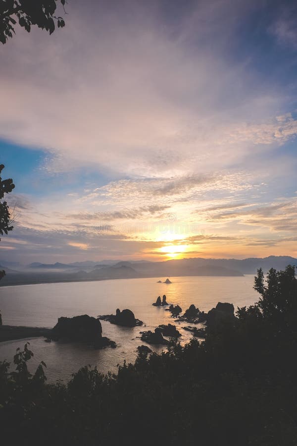 The Sun Rises from the Eastern Horizon, Papuma - Jember, Indonesia ...