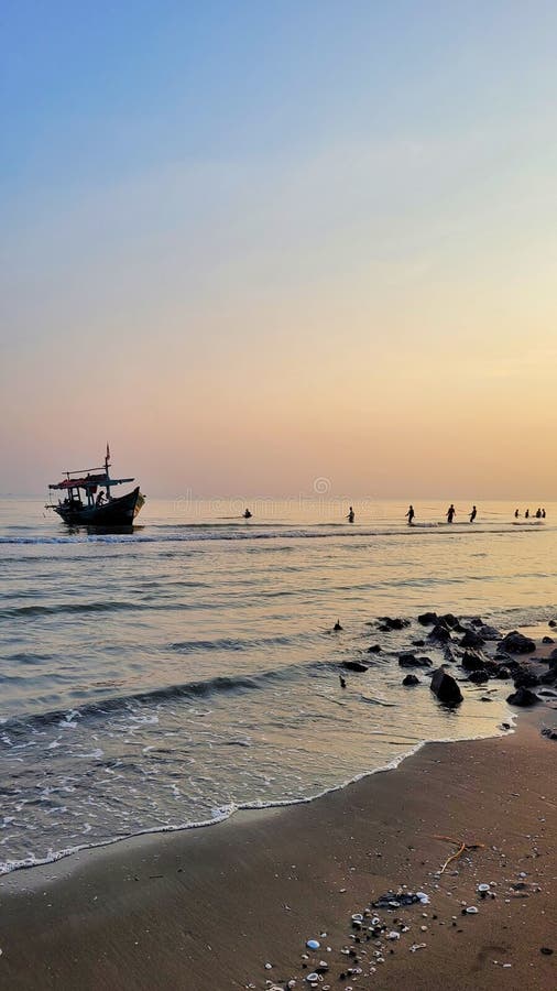 The Sun Rises and Fishermen Catch Fish in the Morning Stock Image ...