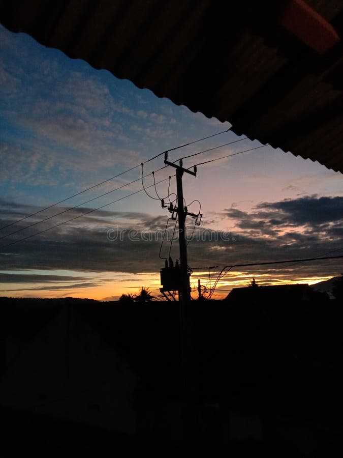 The Sun Rises at 5 in the Morning with the Shadow of an Electric Pole ...