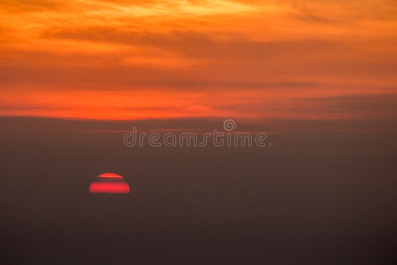 The Sun Rises in the Morning Sky with Clouds. Stock Image - Image of ...