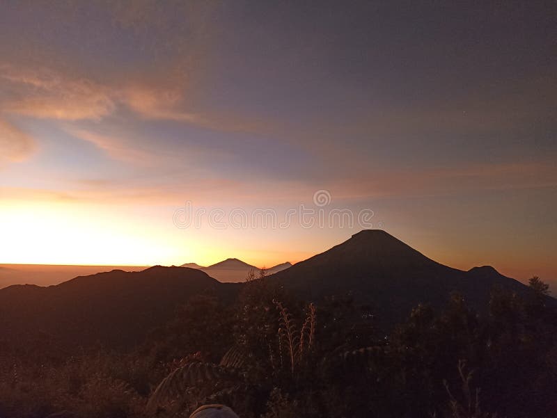 The Sun that Rises in the Morning between Two Mountains Stock Image ...