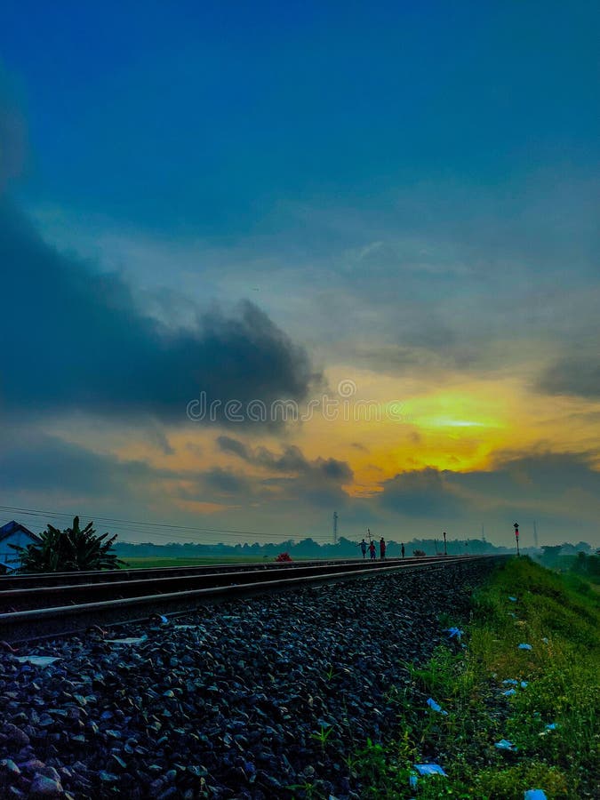 The Sun Rises on the Railroad Tracks Stock Photo - Image of railway ...