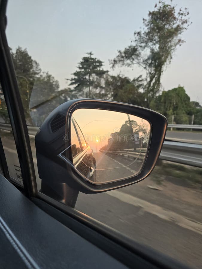 Sun Rises on Side Mirror on the Car with Orange Light Stock Image ...