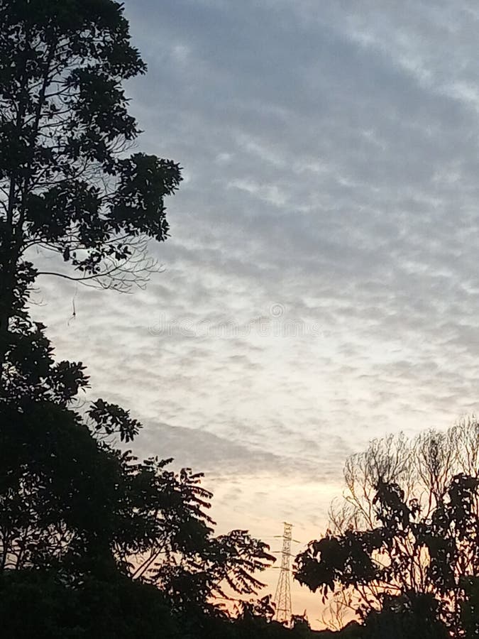 The Sun Rises in a Slightly Cloudy Morning Stock Image - Image of ...