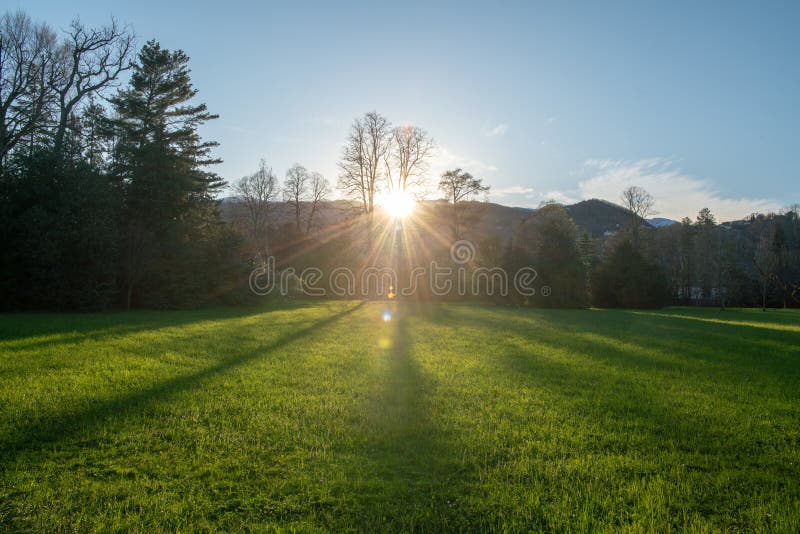 The Sun Rising from the Mountains and the Sun S Rays Opening Up ...