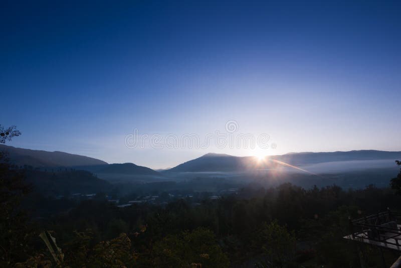 The Sun is Rising in the Mountains Stock Image - Image of rising ...