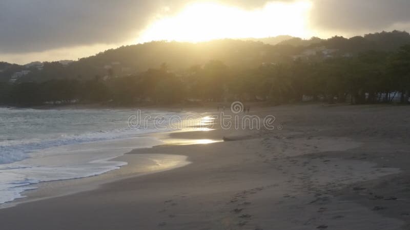 Sun rising over the beach stock image. Image of white - 194735293