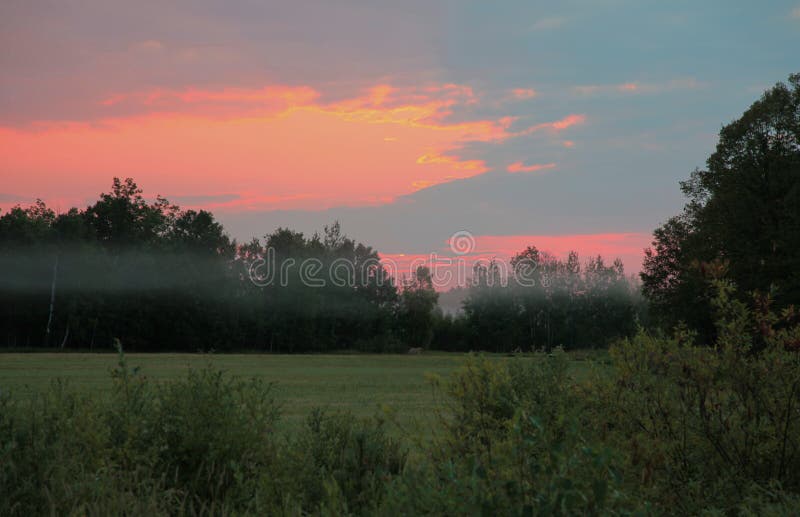 Sun rising over the field stock photo. Image of morning - 32934182