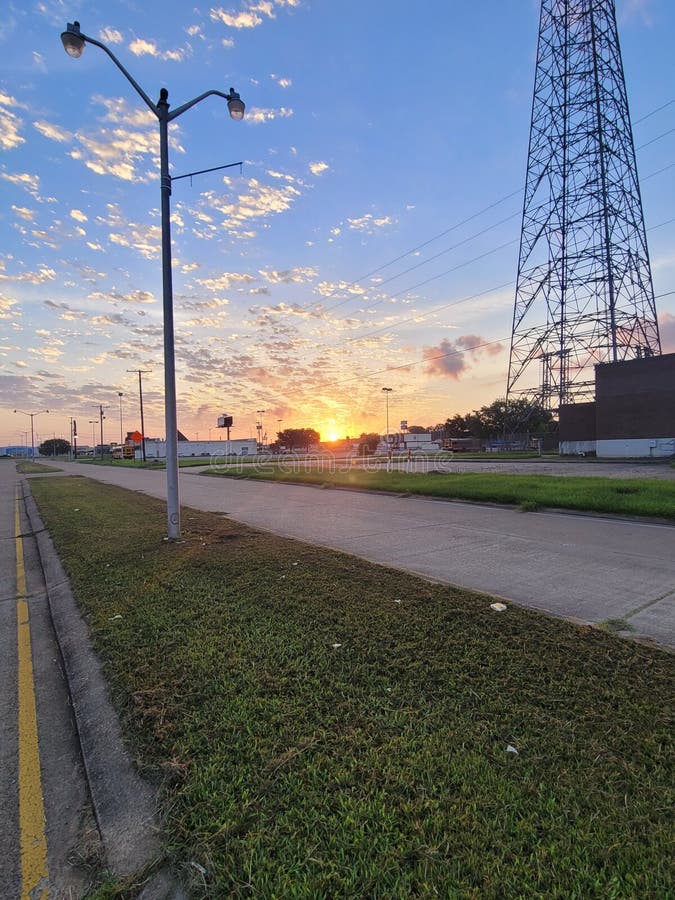 Sun rising over horizon stock photo. Image of road, reflection - 249739208