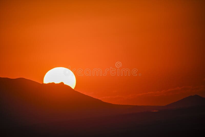 The Sun Rising Over the Horizon of the Mountains Stock Image - Image of ...