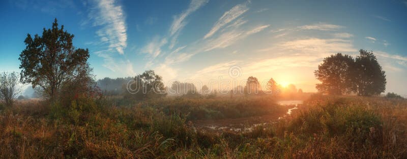 Sun Rising Over Meadow in Misty Autumn Morning Stock Photo - Image of ...