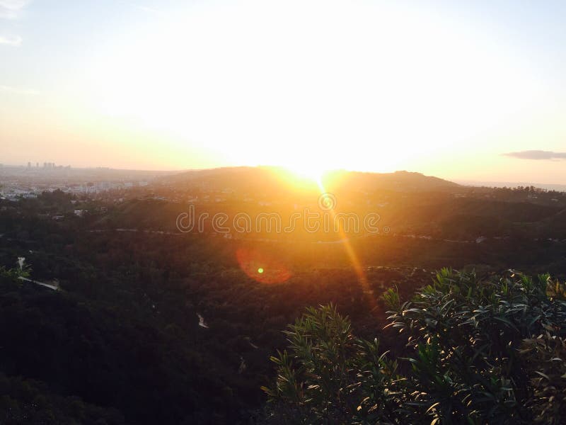 Sun rising over mountain stock image. Image of rising - 75729501