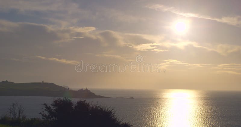 Sun rising over the ocean stock footage. Video of sunrise - 43747708