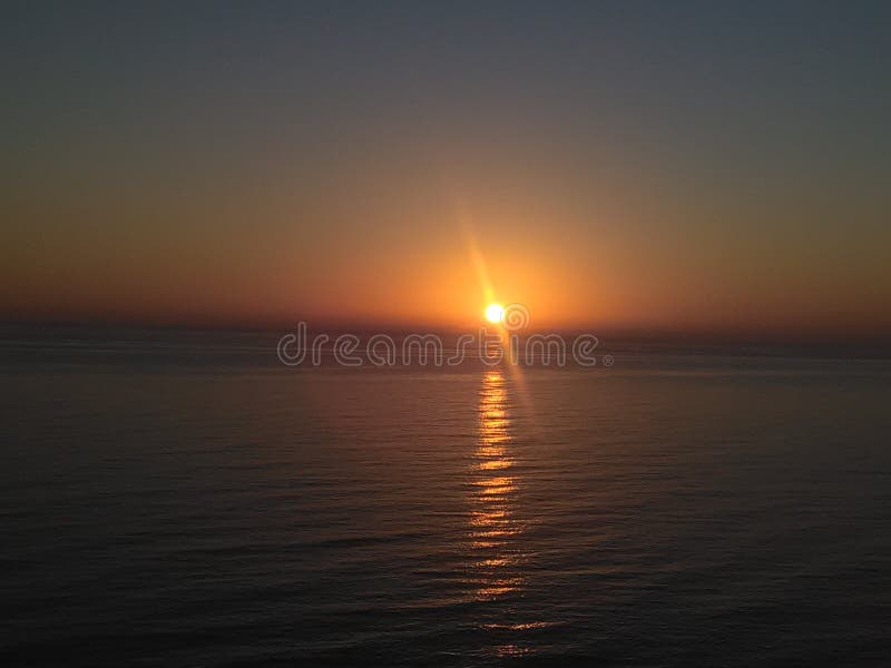 Sun rising stock photo. Image of front, ocean, sunlight - 84665220
